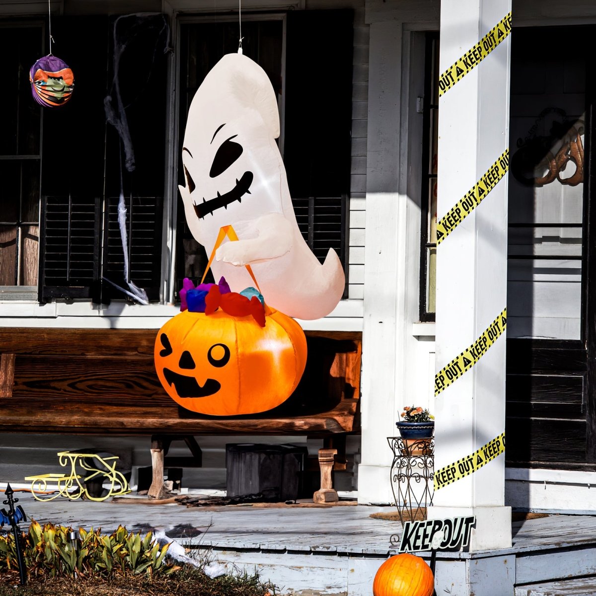 5ft. Inflatable Ghost Holding Trick or Treat Bag | PopFun